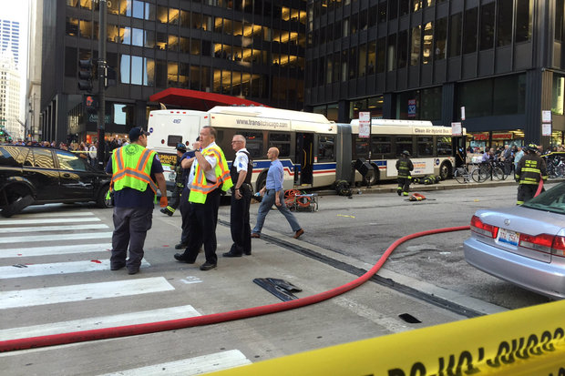 CTA Bus Crashes Onto Michigan Avenue Sidewalk, Killing Woman and ...