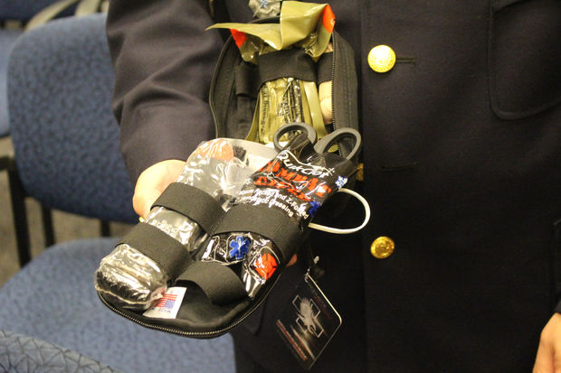 Police Officers Getting Combat Medical Kits - Downtown - Chicago - DNAinfo